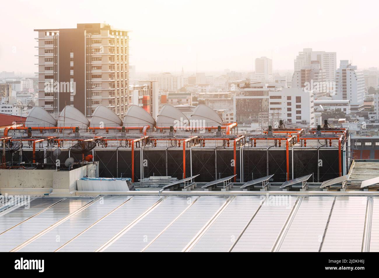 rooftop of building HVAC Air Chillers with solar panel. modern Bangkok ...