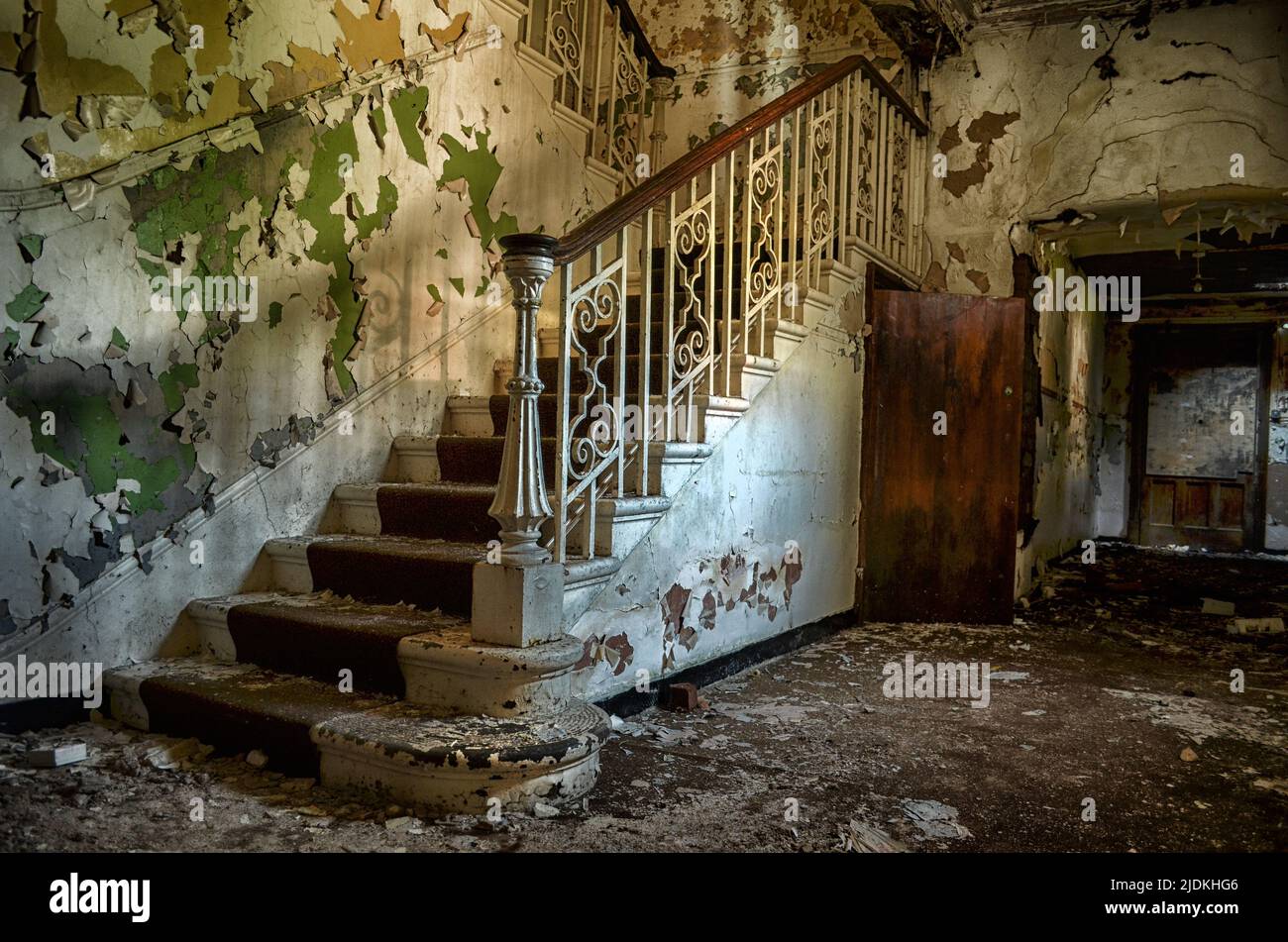 Interior of derelict building with grand staircase Stock Photo - Alamy