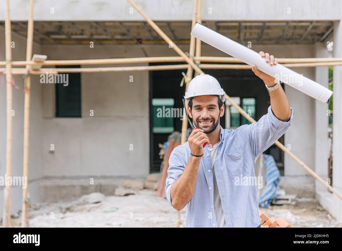 Engineer builder. Happy Foreman work in construction site. senior ...