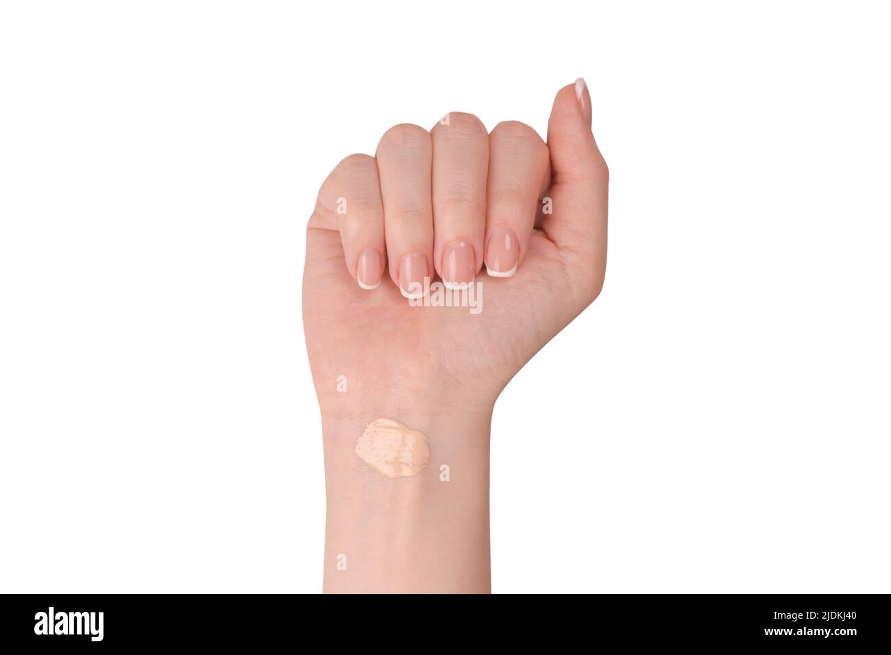 Swatch of foundation on a woman hand isolated on a white background ...