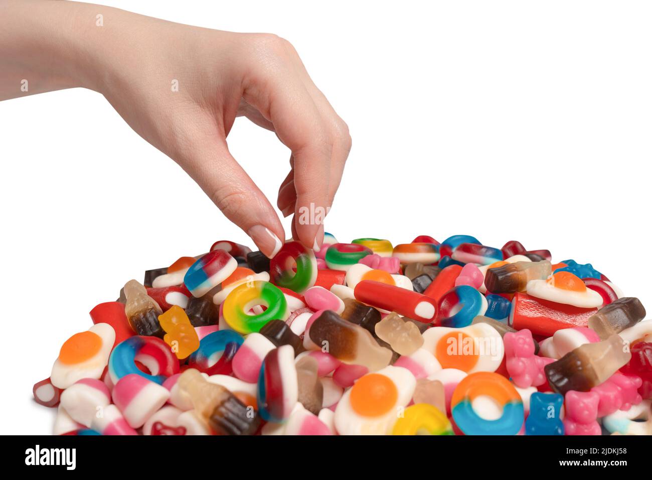 Woman hand takes a jelly candy on a white background Stock Photo - Alamy