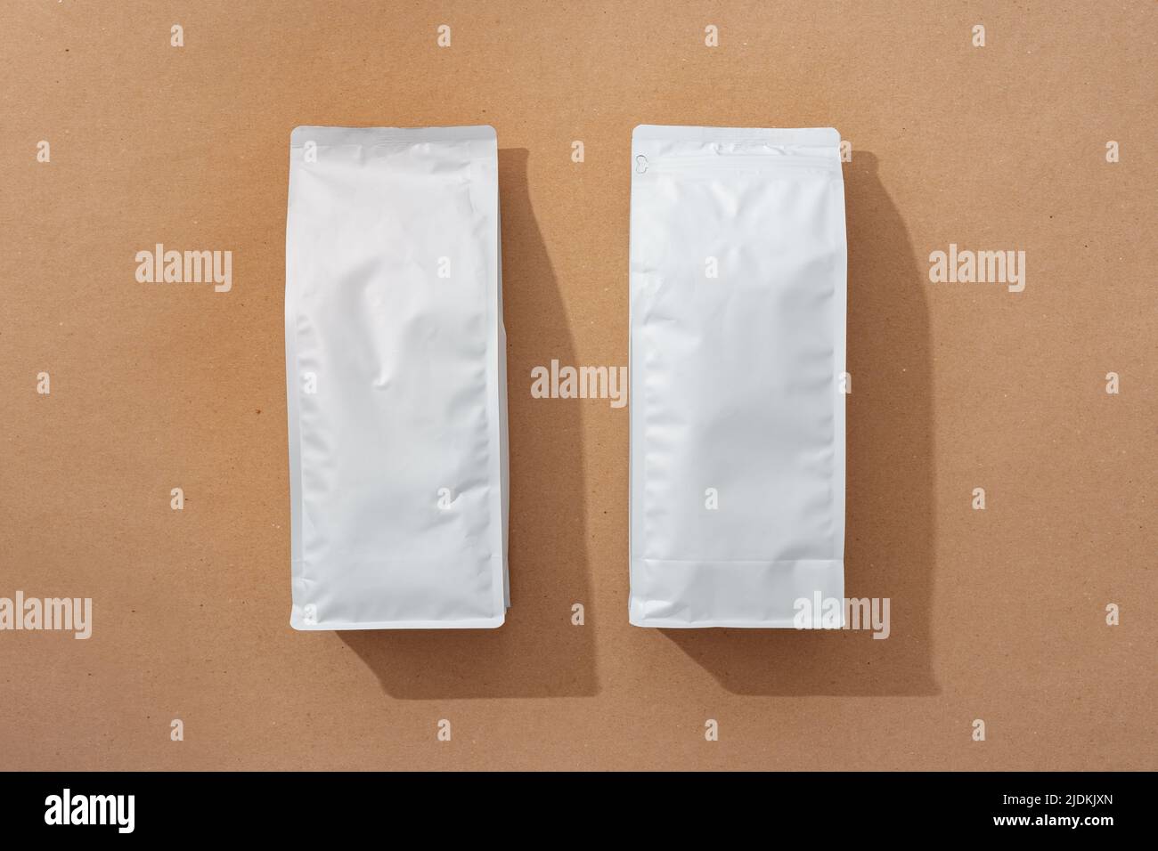 White blank matte coffee package on paper background Stock Photo - Alamy