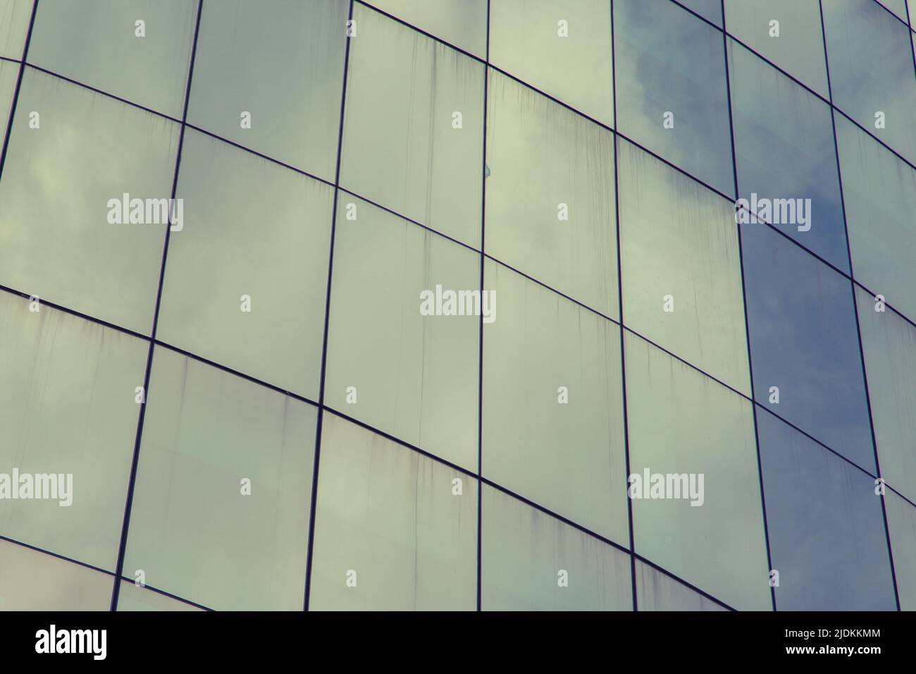 Blue glass of windows building background Stock Photo - Alamy