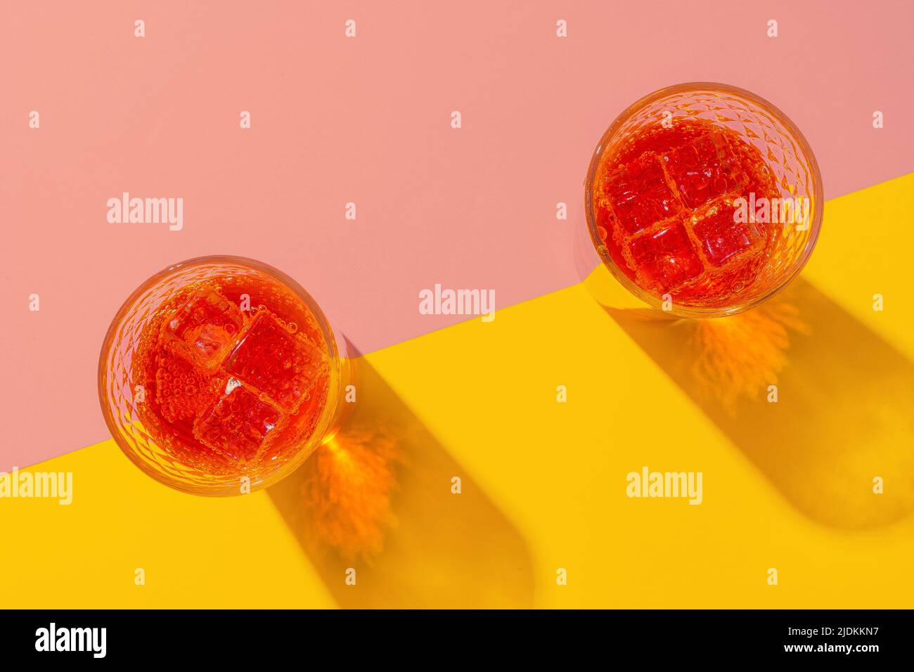 Refreshing pink punch cocktail on color background Stock Photo - Alamy