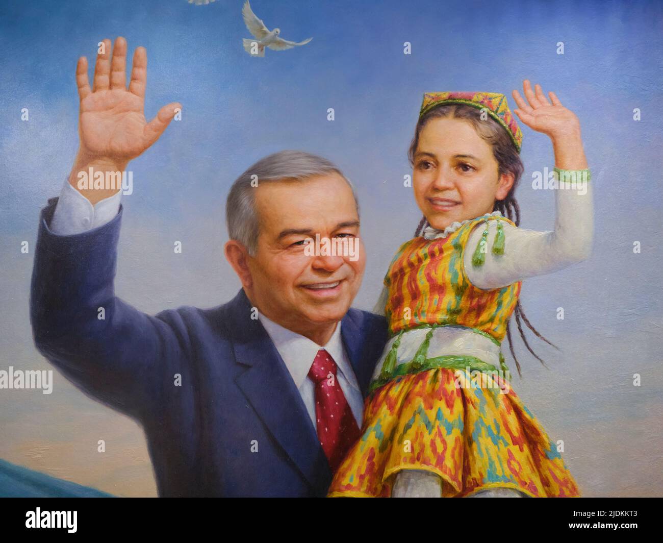 Karimov holding a happy child, waving. Detail of an oil painting of ...
