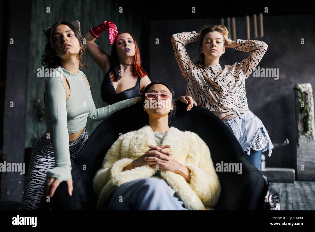 Portrait of vogue house father with dance crew wearing extravagant ...