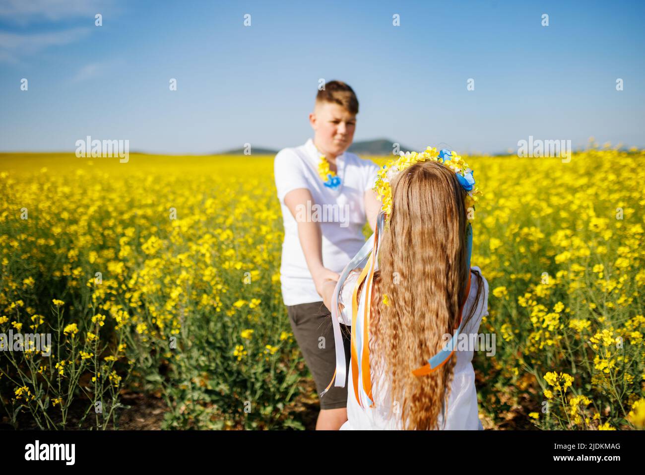 Cheerful joyful teenagers: older brother and laughing sister with ...