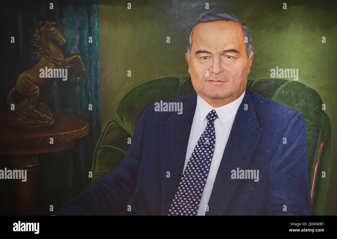 A portrait of a sitting Karimov with horse sculpture. Detail of an oil ...