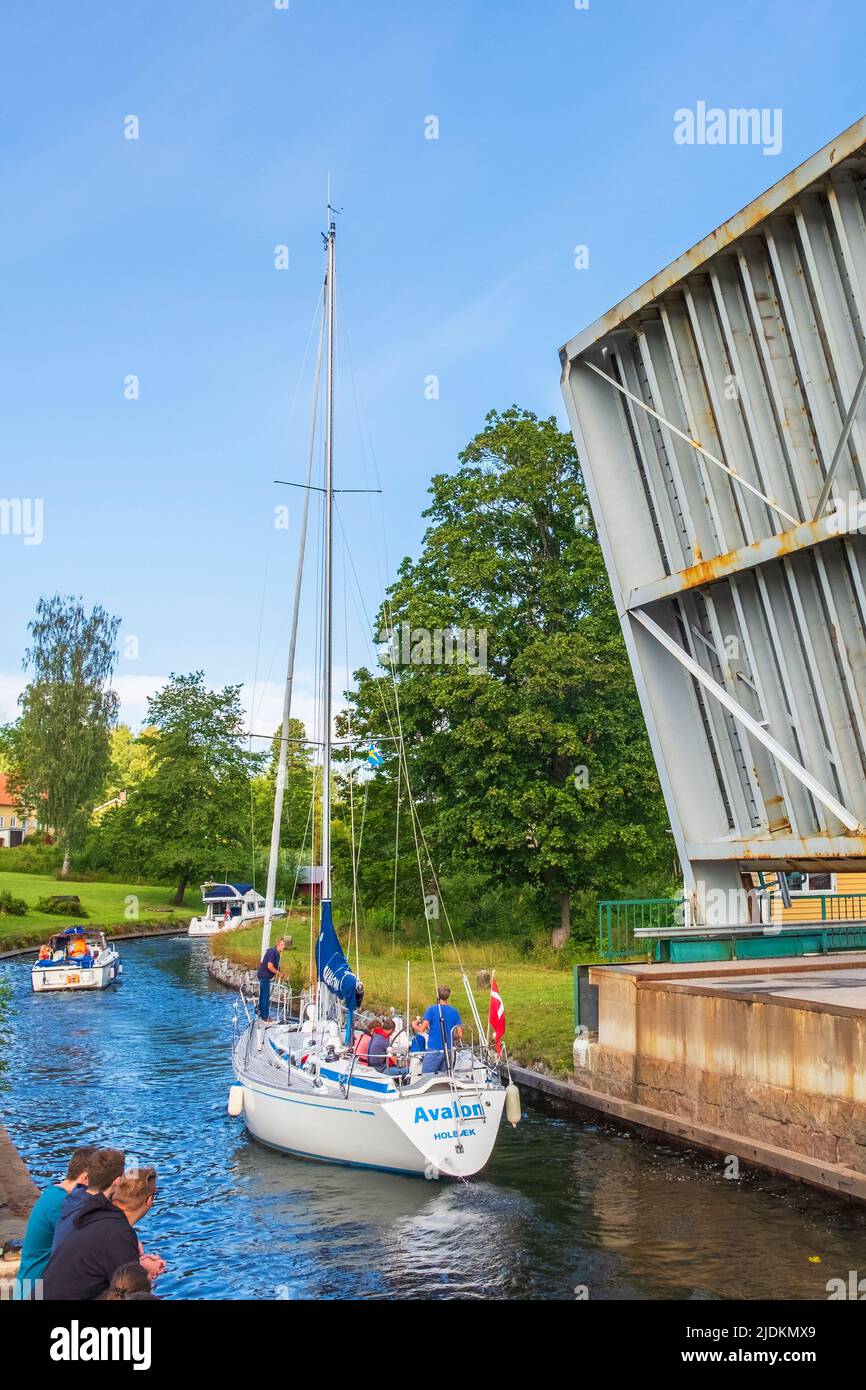Boats in Gota canal with an opened bridge Stock Photo - Alamy