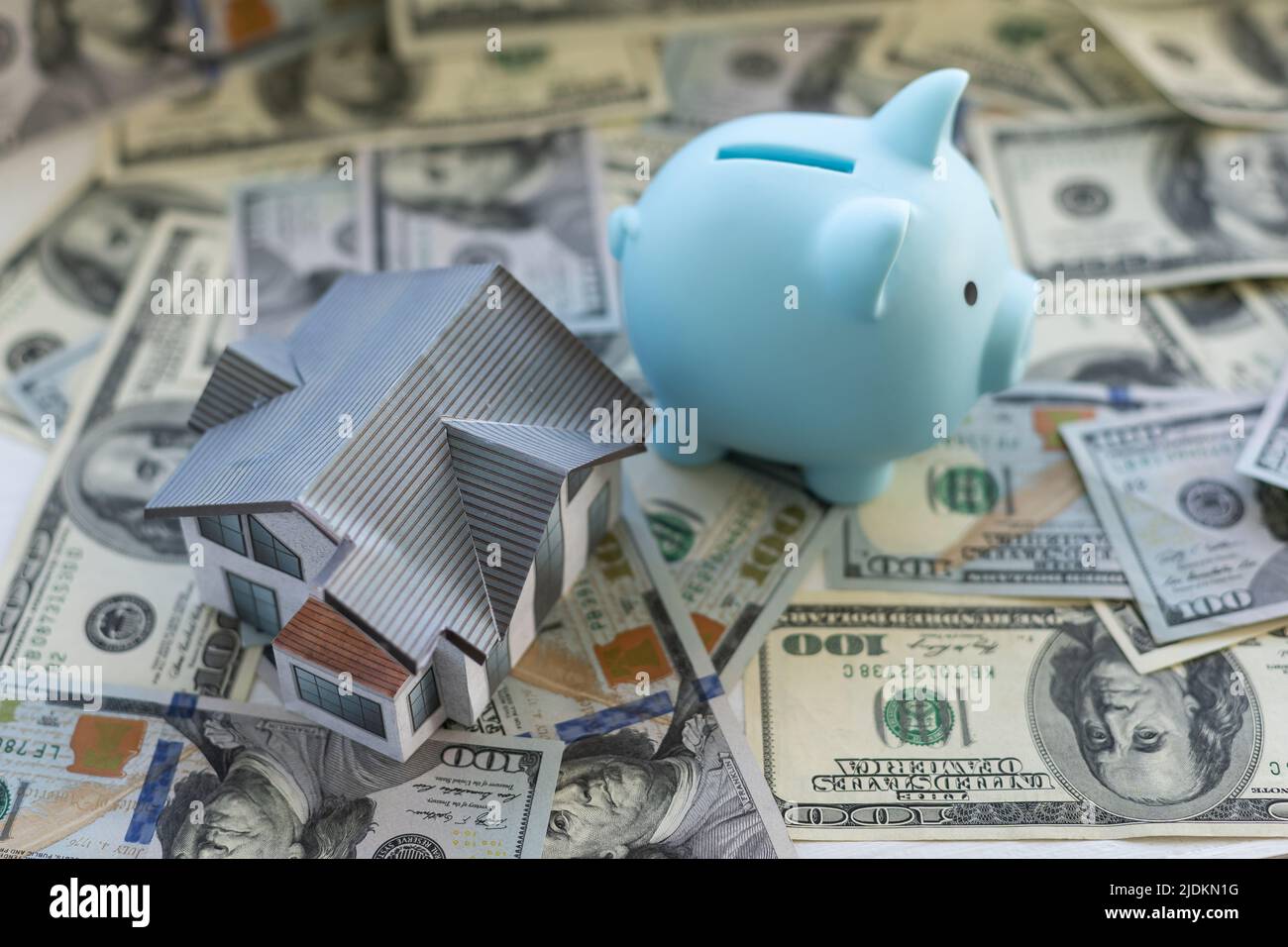 dollars piggy bank, paper house, Money background Stock Photo - Alamy