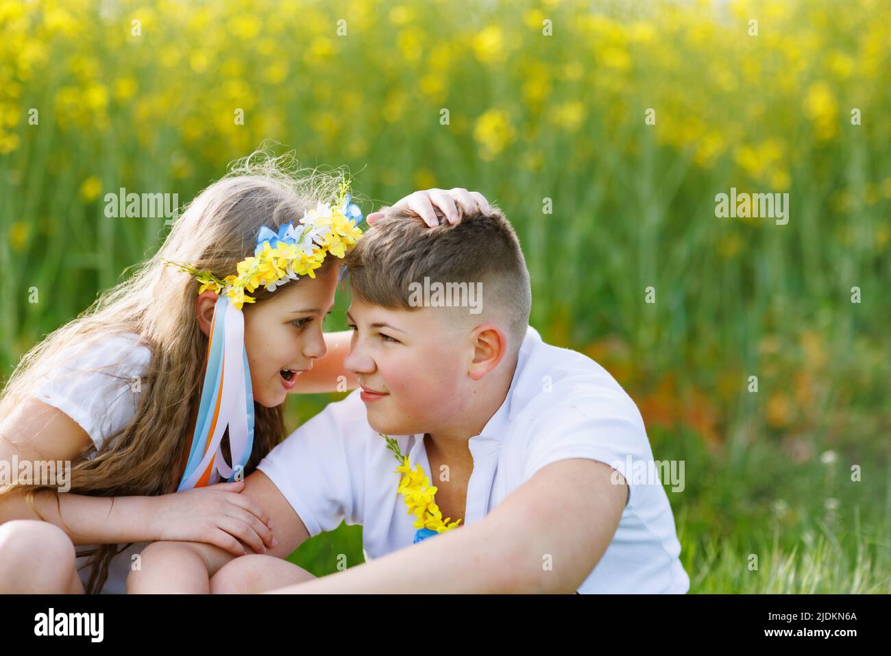 Native joyful teenage children enjoying warm weather: big strong kind ...