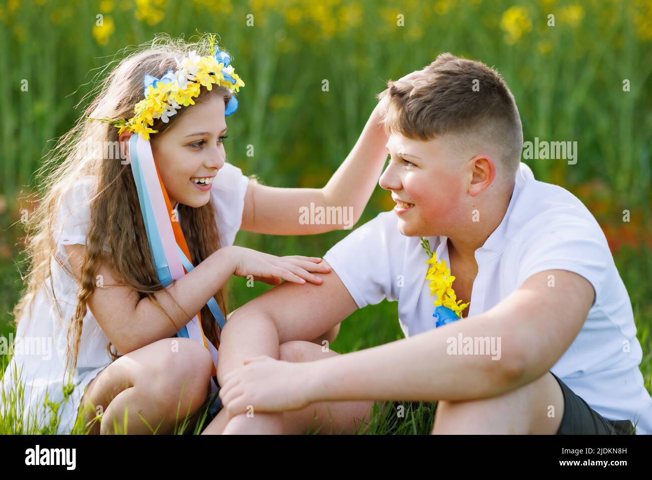 Native joyful teenage children enjoying warm weather: big strong kind ...