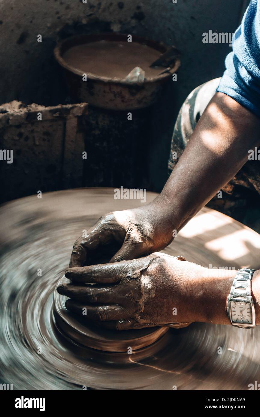 Visit to Thimi Ceramics in Bhaktapur, potter making a vase or a mug ...