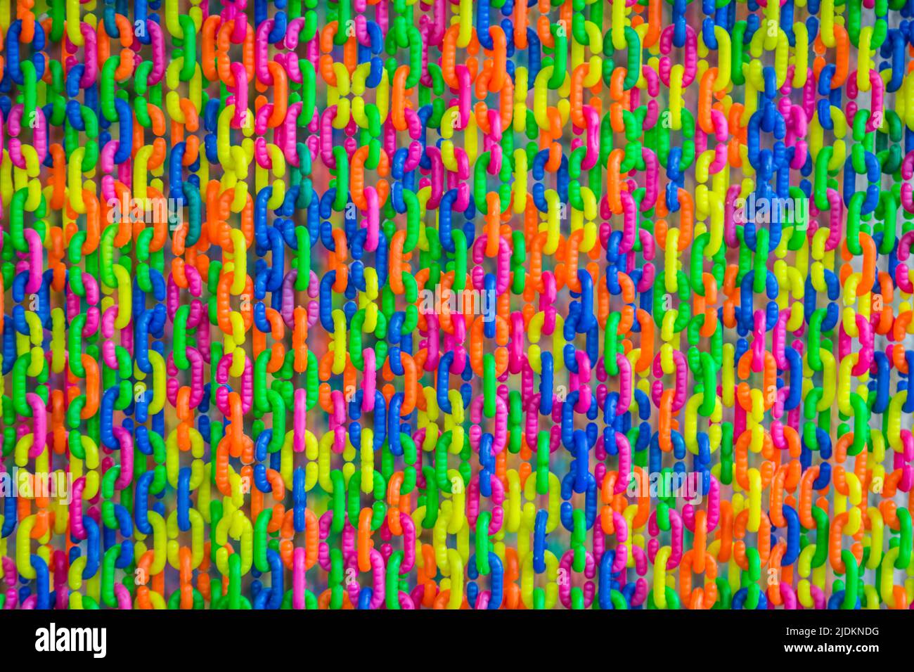 Colorful plastic chain background Stock Photo - Alamy
