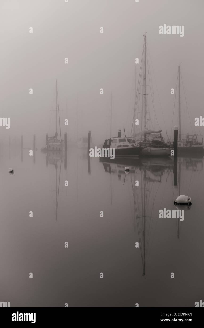 Boats in the Mist - River Yar, Yarmouth, Isle of Wight, UK Stock Photo ...