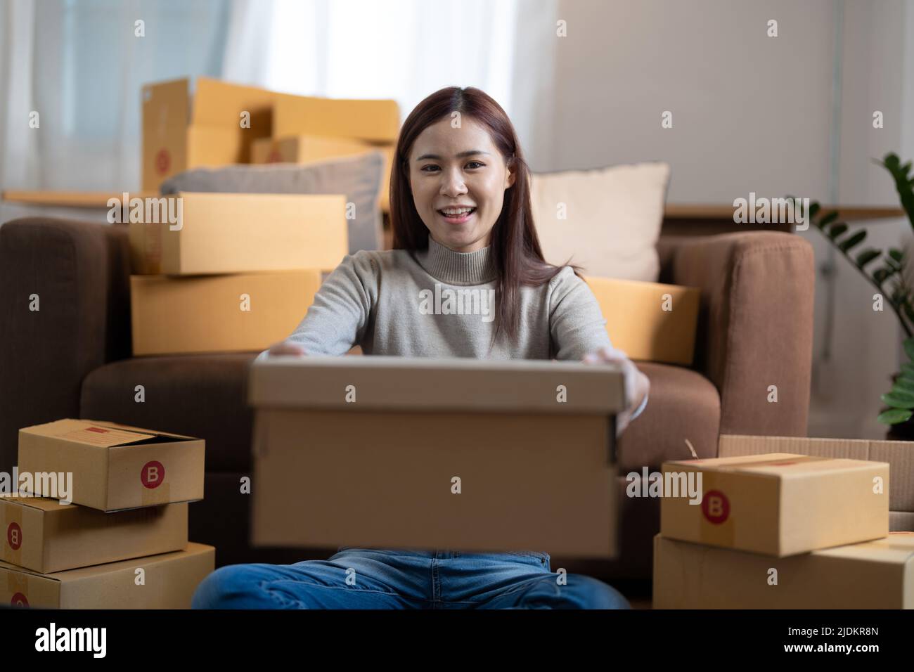 Portrait happy asian female online store small business owner ...