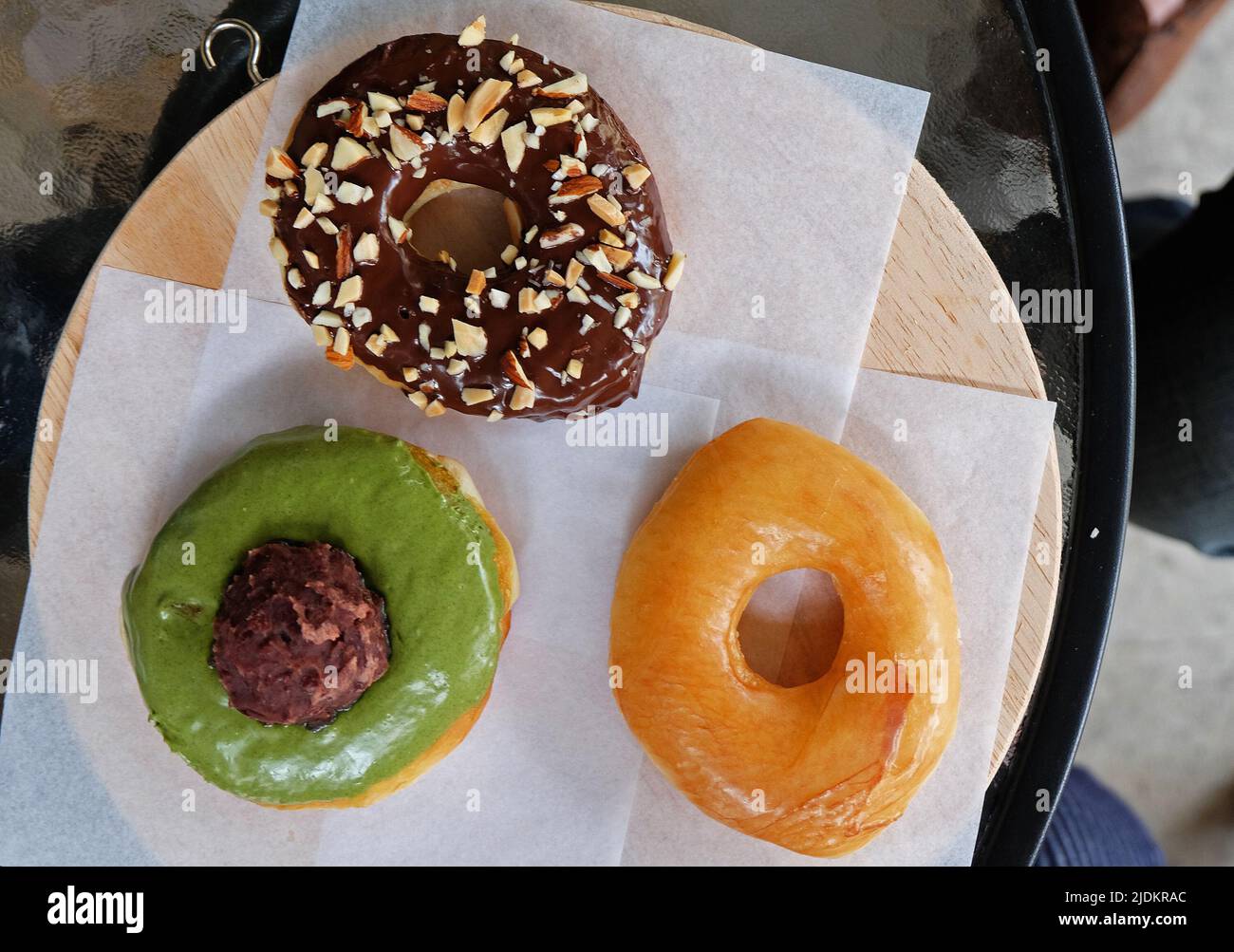 Close up box of assorted Doughnuts Stock Photo - Alamy