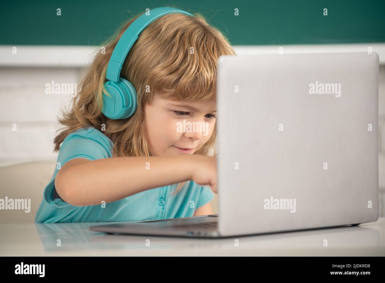 Student using headphone in classroom hi-res stock photography and ...