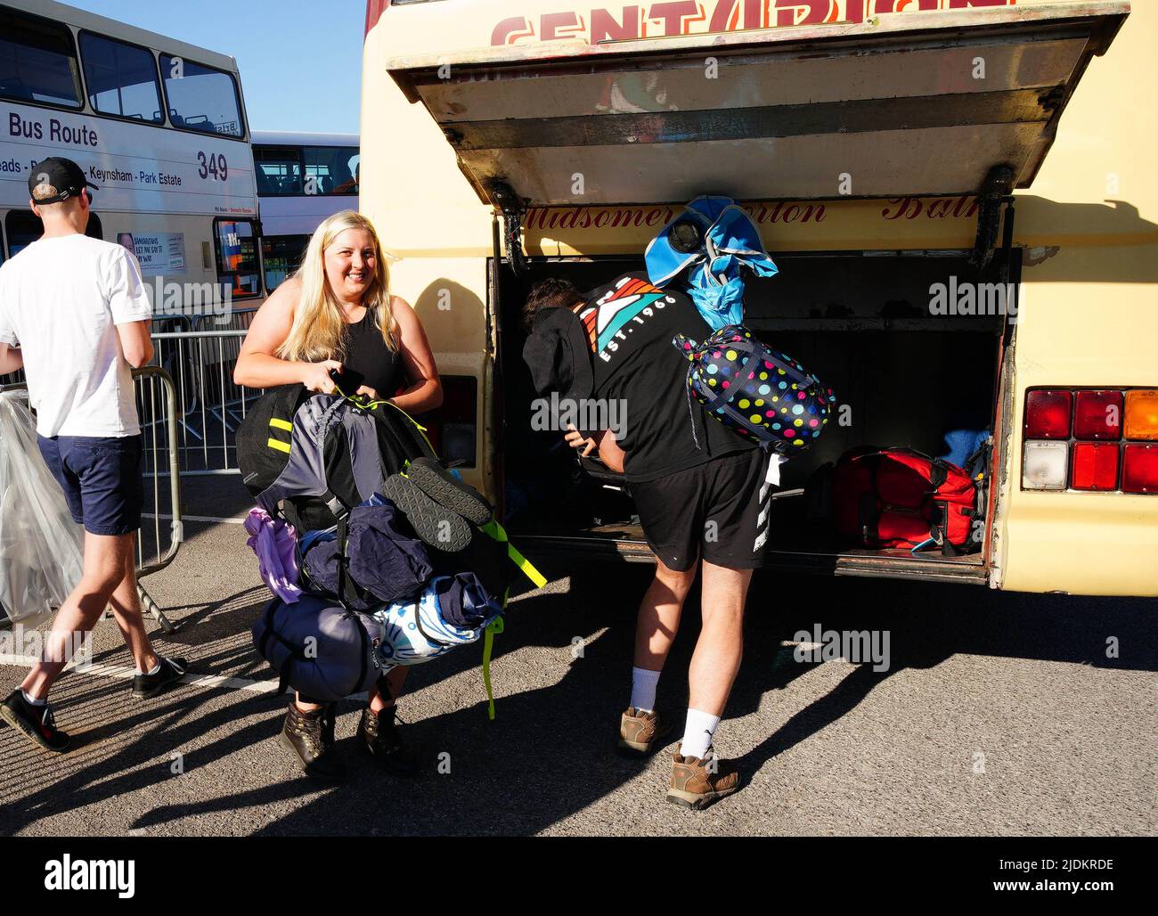 People board a bus at Castle Cary station heading to the Glastonbury ...