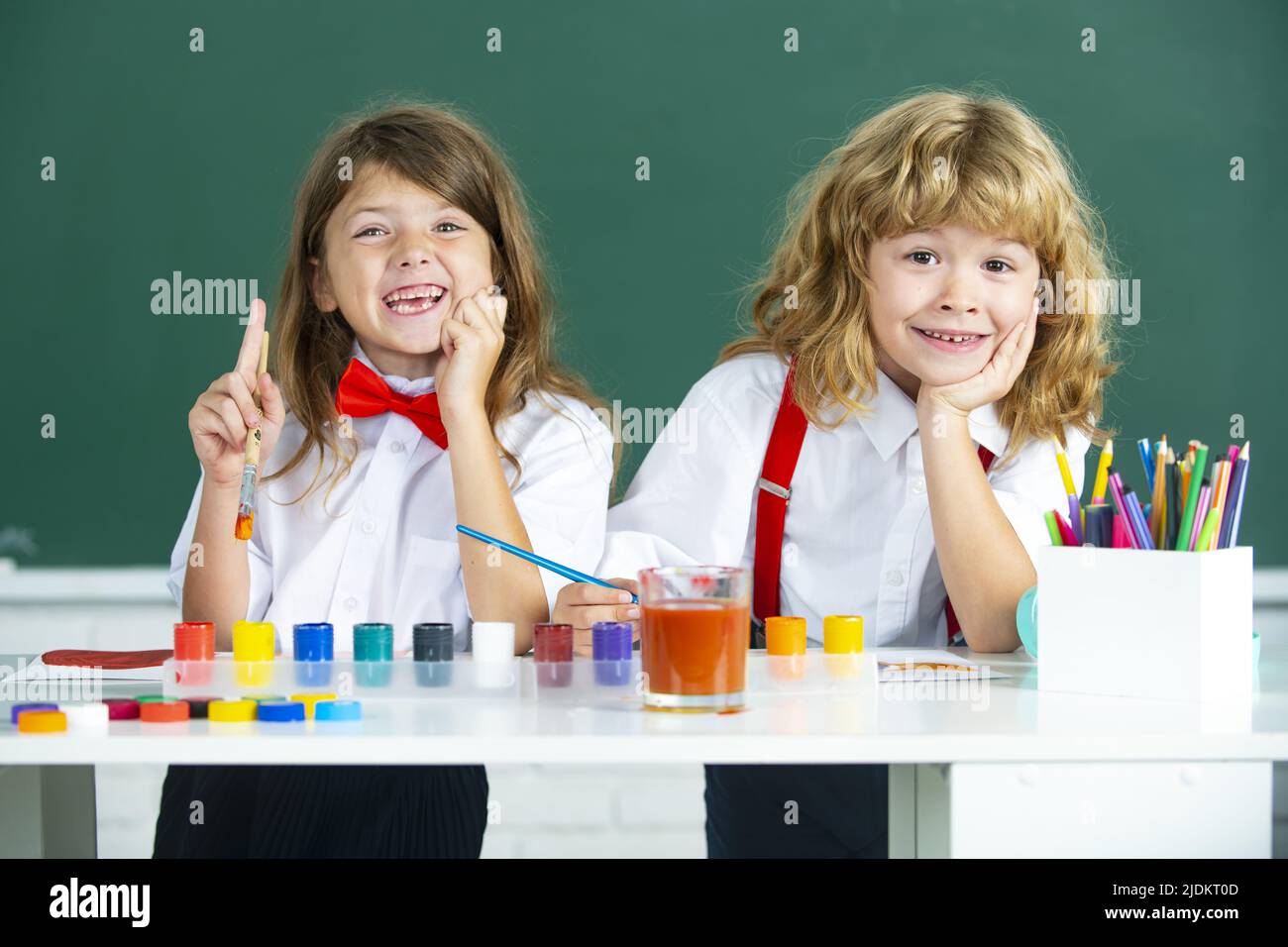 School friends. Cute little school kids friends studying together in ...