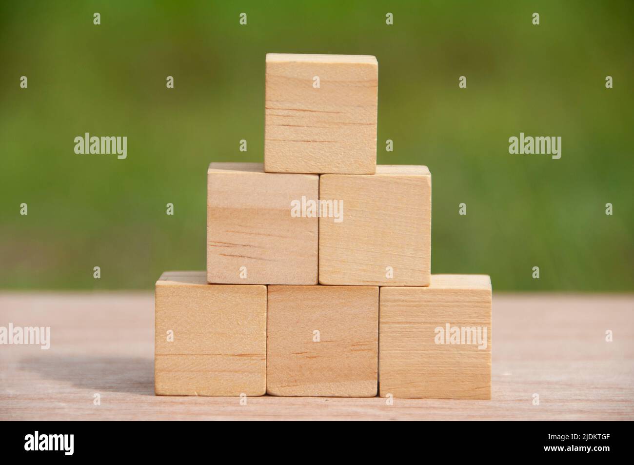 Blank wooden blocks with blurred nature background. Copy space Stock ...