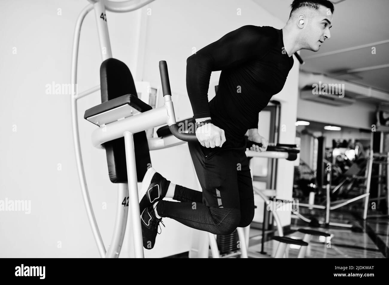 Muscular arab man training in modern gym Stock Photo - Alamy