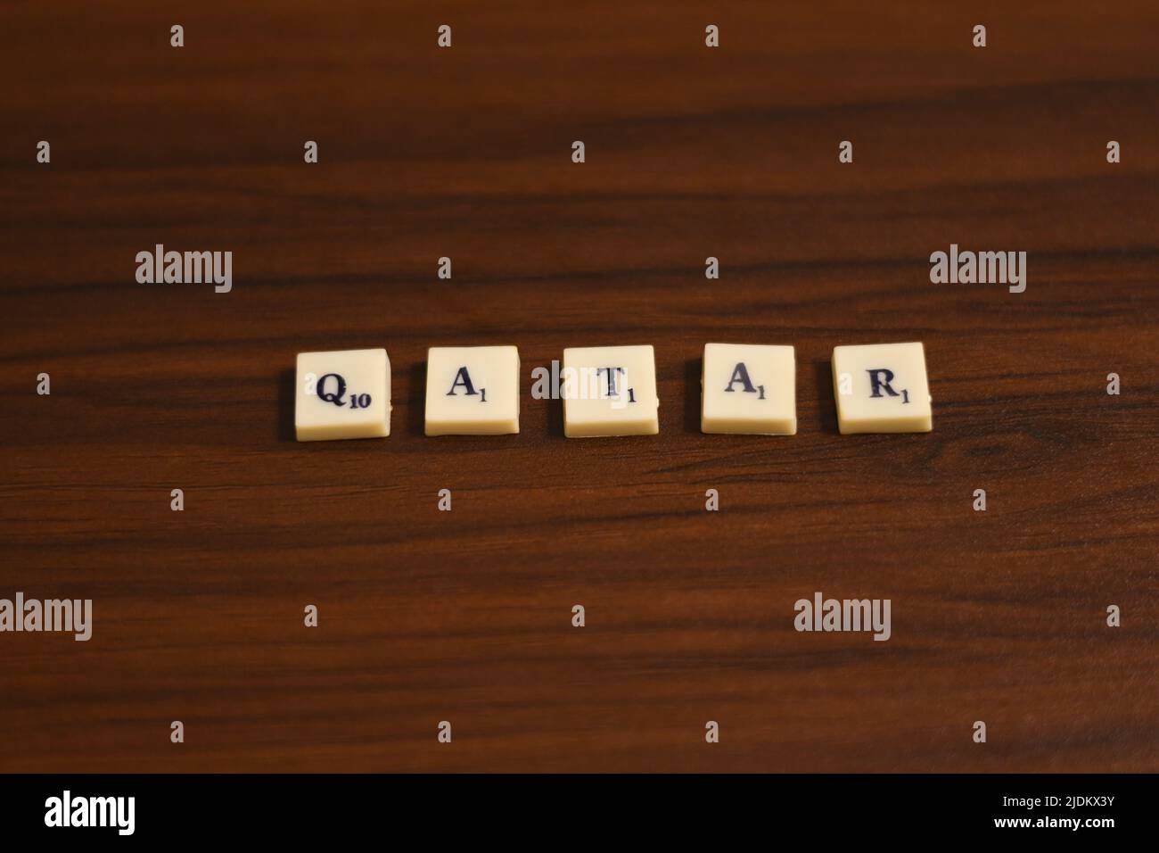 Selective focused close up shot of Qatar word. Made by using the ...