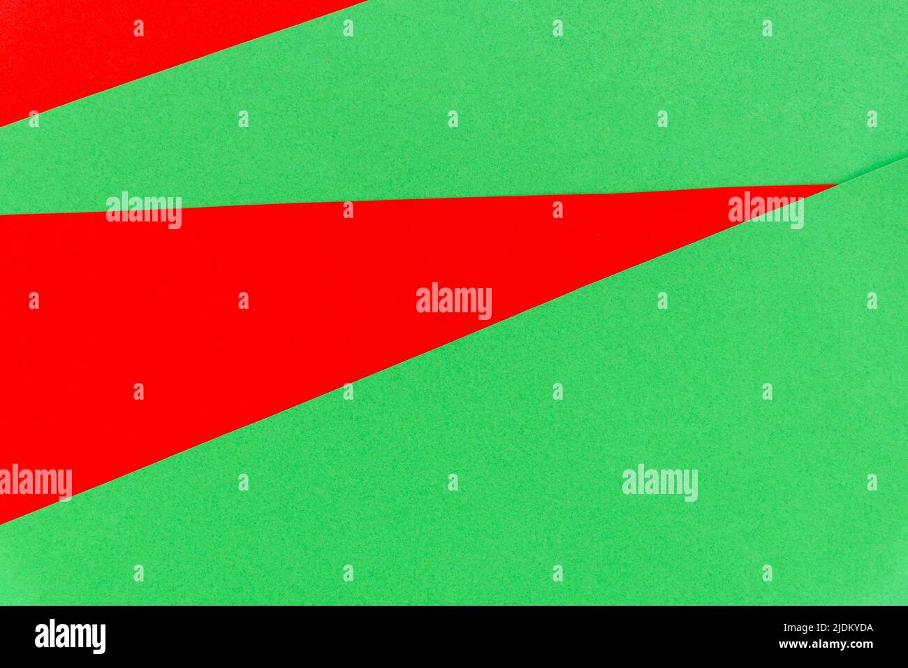 Abstract with red on green sheets background. Natural bright color ...