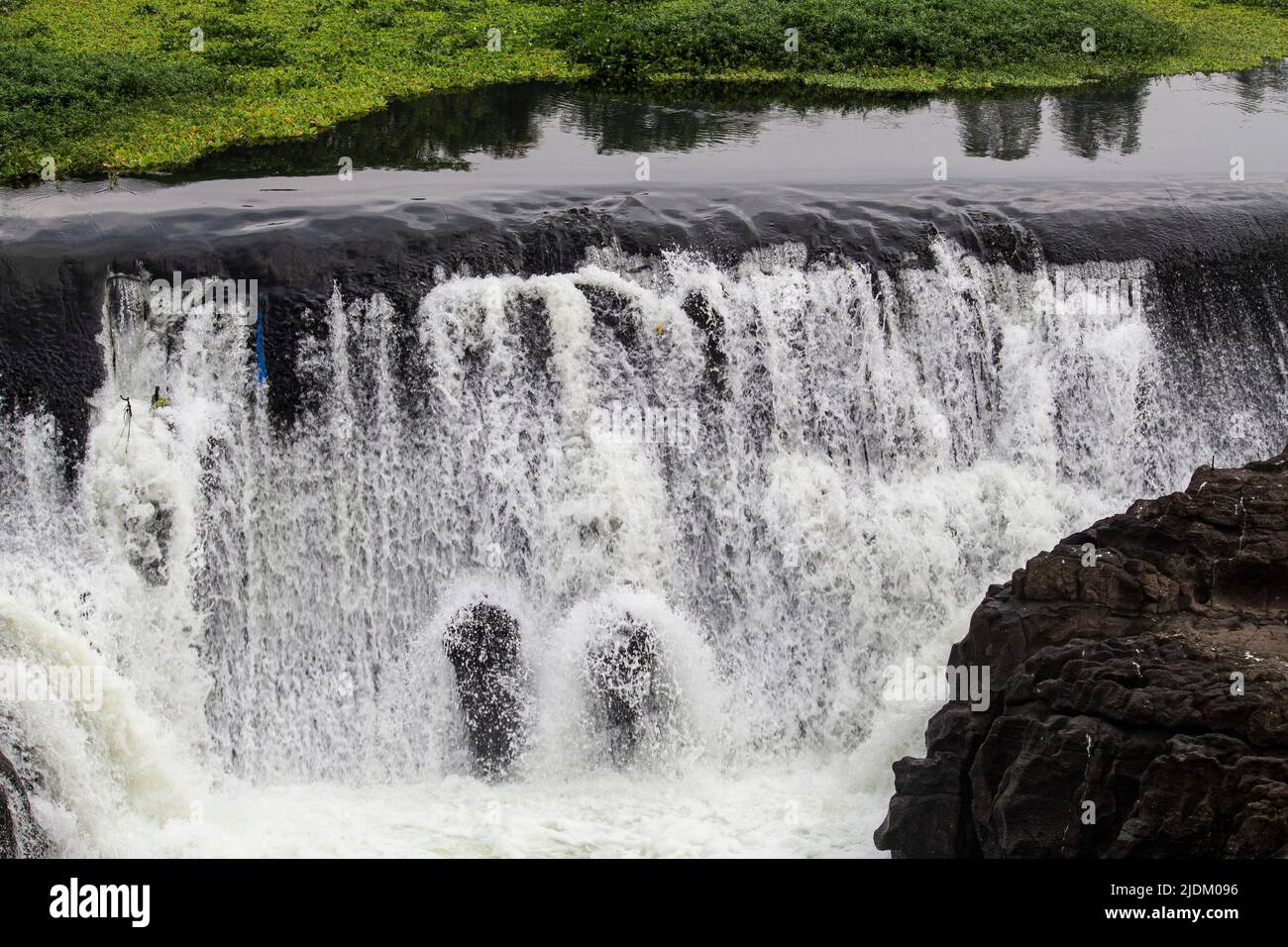 iron bridge on the river, green, waterfall Stock Photo - Alamy