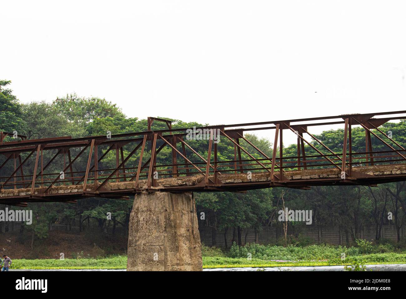 iron bridge on the river, green, waterfall Stock Photo - Alamy
