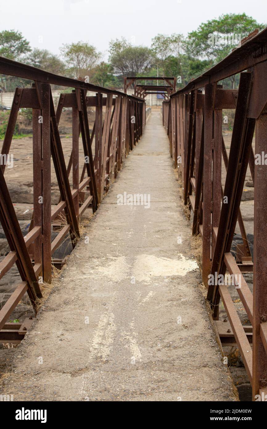 iron bridge on the river, green, waterfall Stock Photo - Alamy