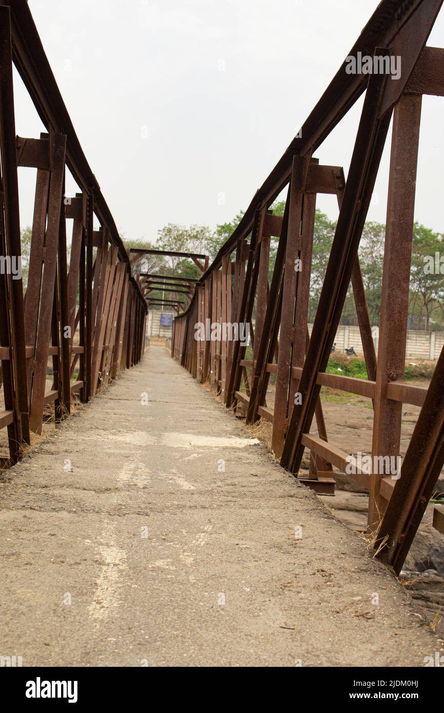 iron bridge on the river, green, waterfall Stock Photo - Alamy