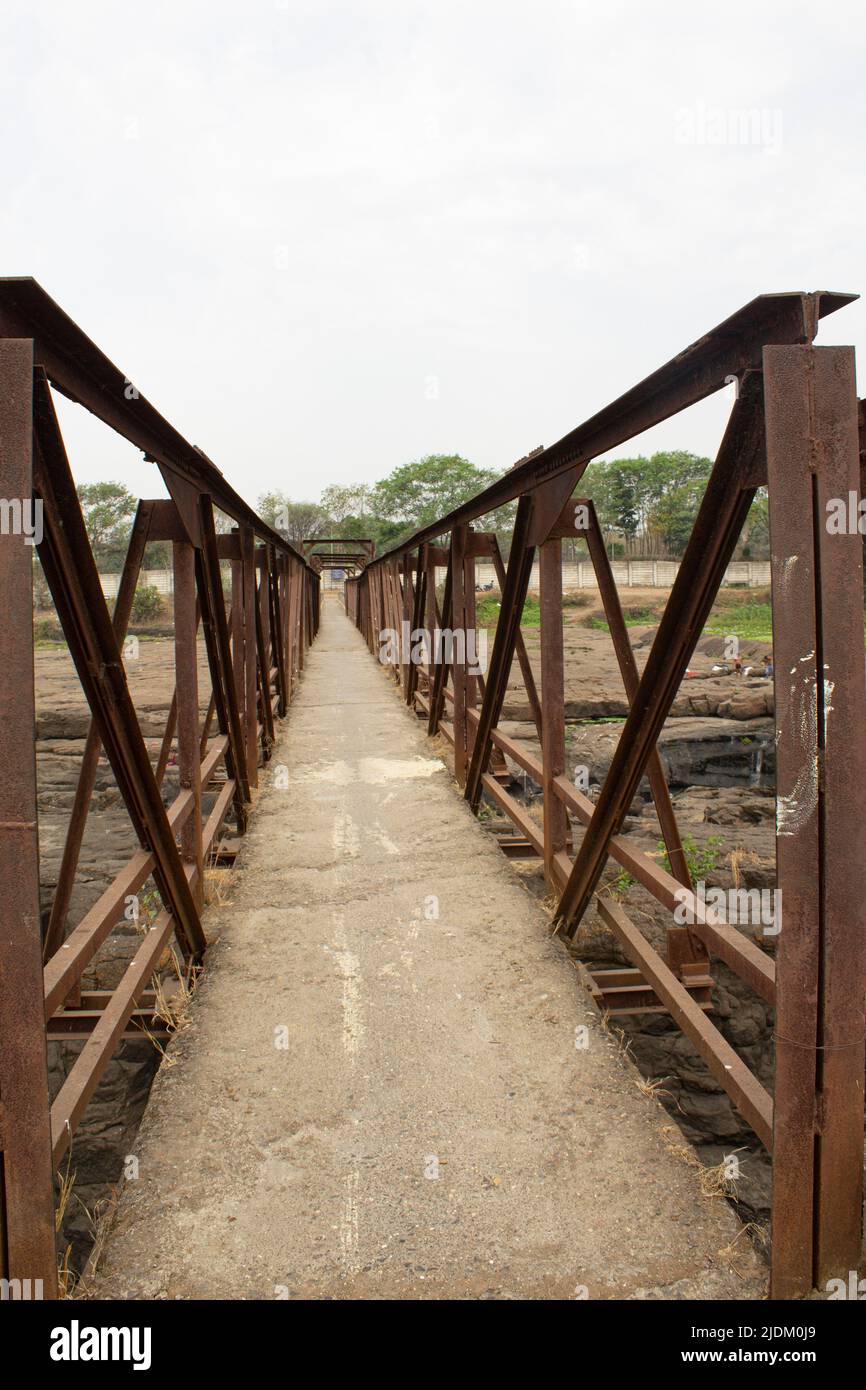 iron bridge on the river, green, waterfall Stock Photo - Alamy