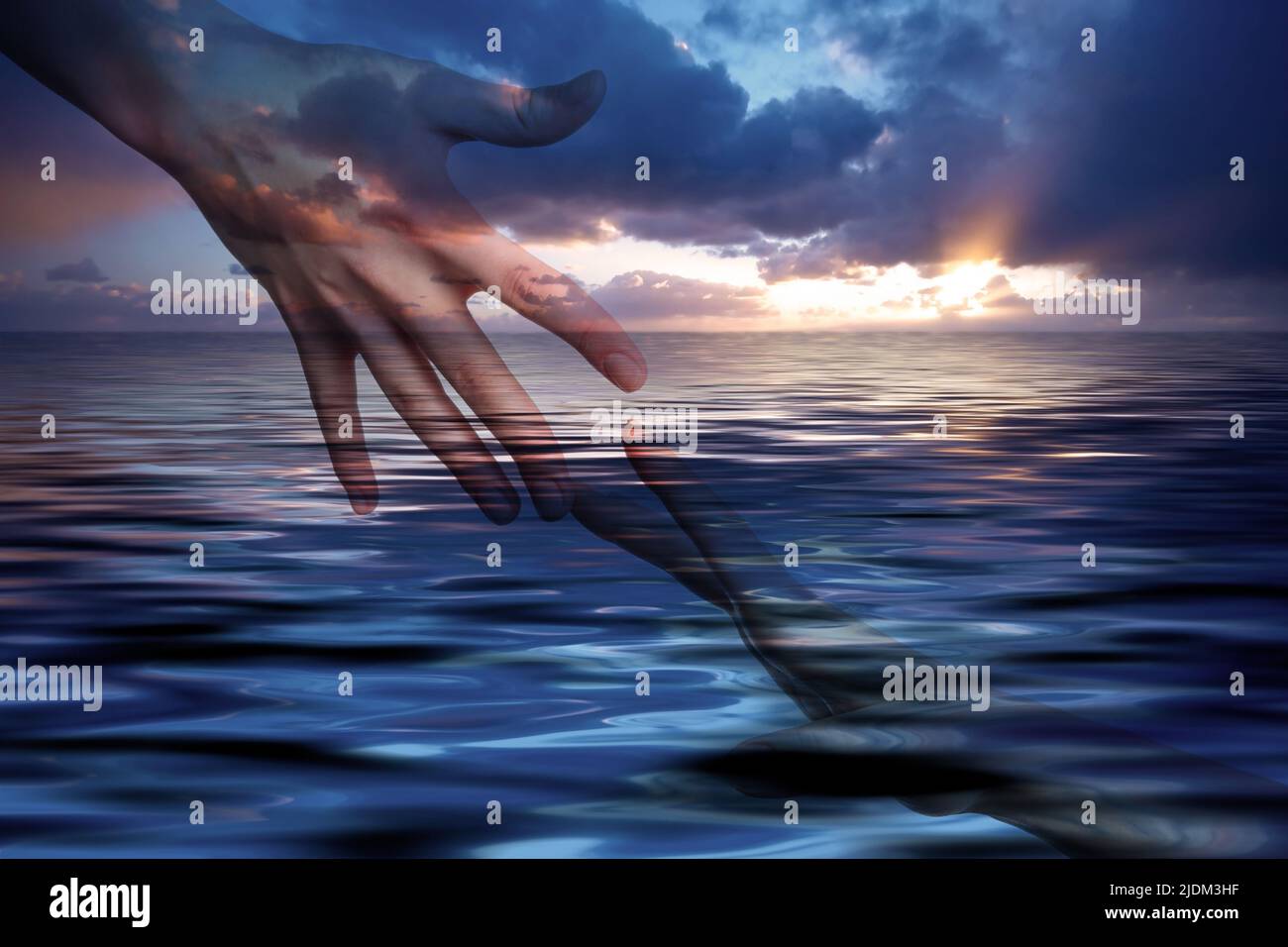 Hope of peace. Hands on the ocean sunrise background Stock Photo - Alamy