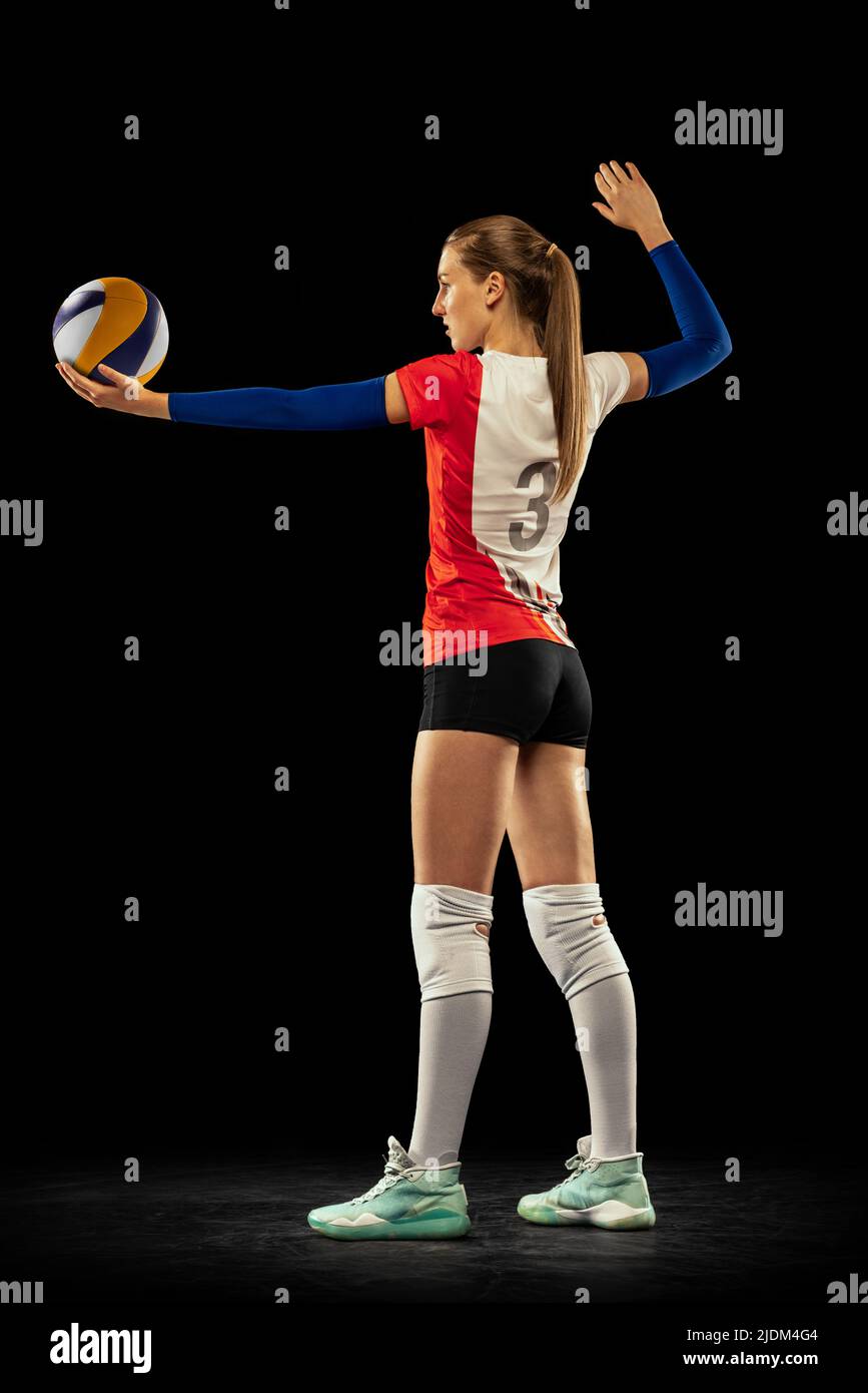 Portrait of beautiful woman, professional volleyball player posing with ...