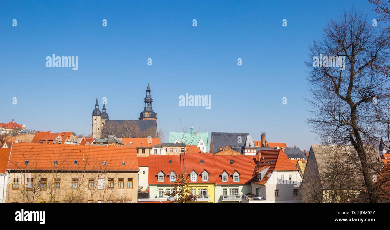 Skyline with colorful houses and church towers in Eisleben, Germany ...