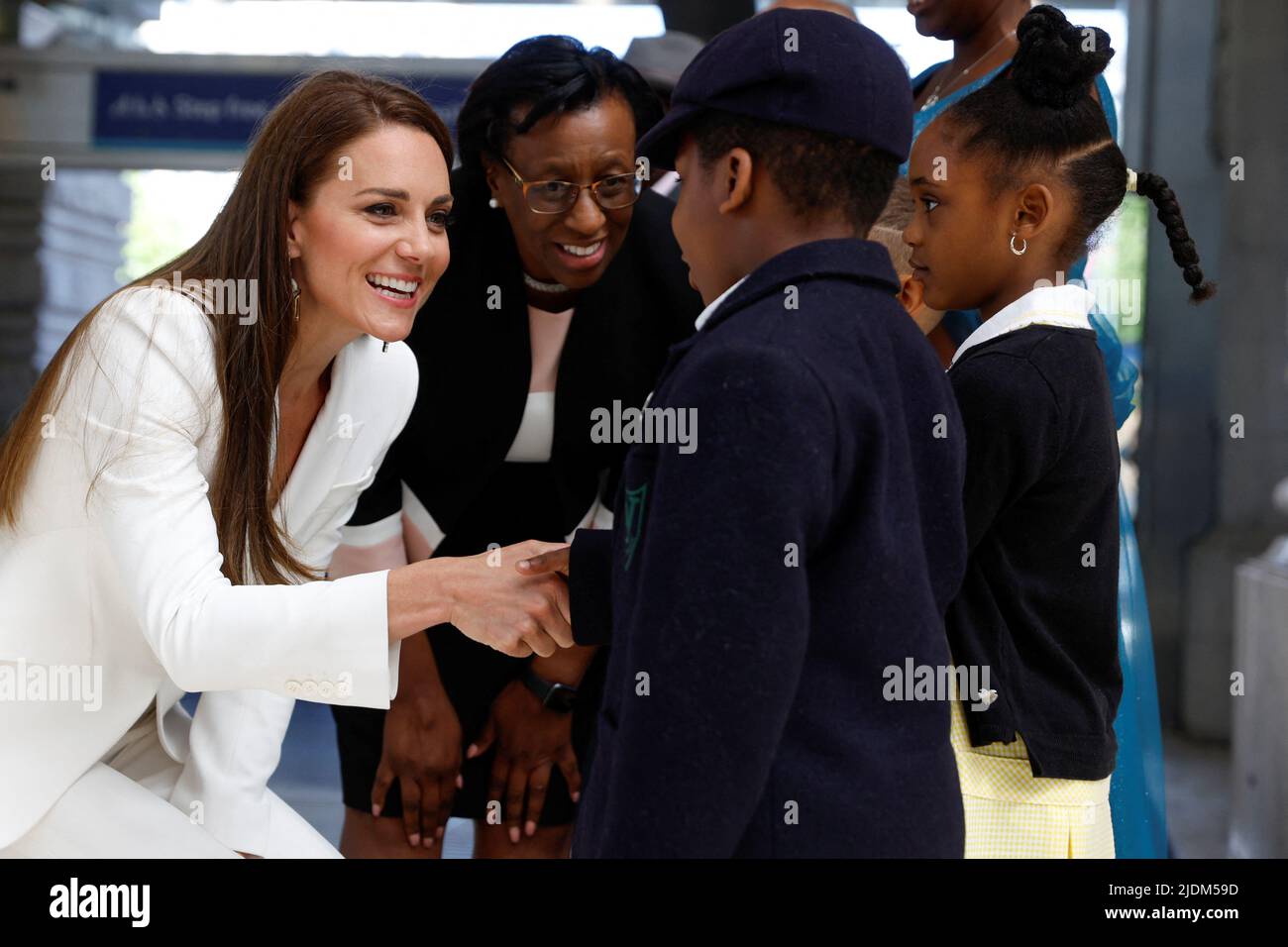 The Duchess of Cambridge speaking to children at the unveiling of the ...