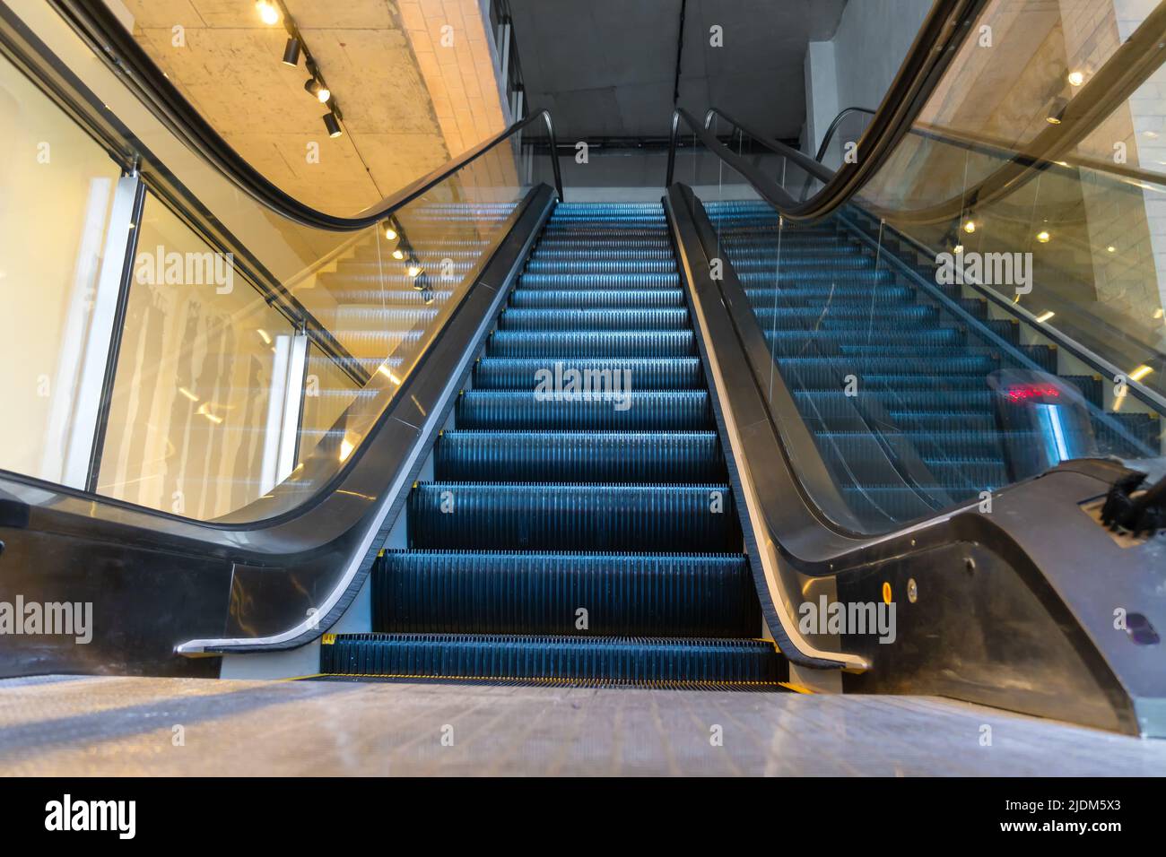 Modern escalators in a shopping mall without people Stock Photo - Alamy