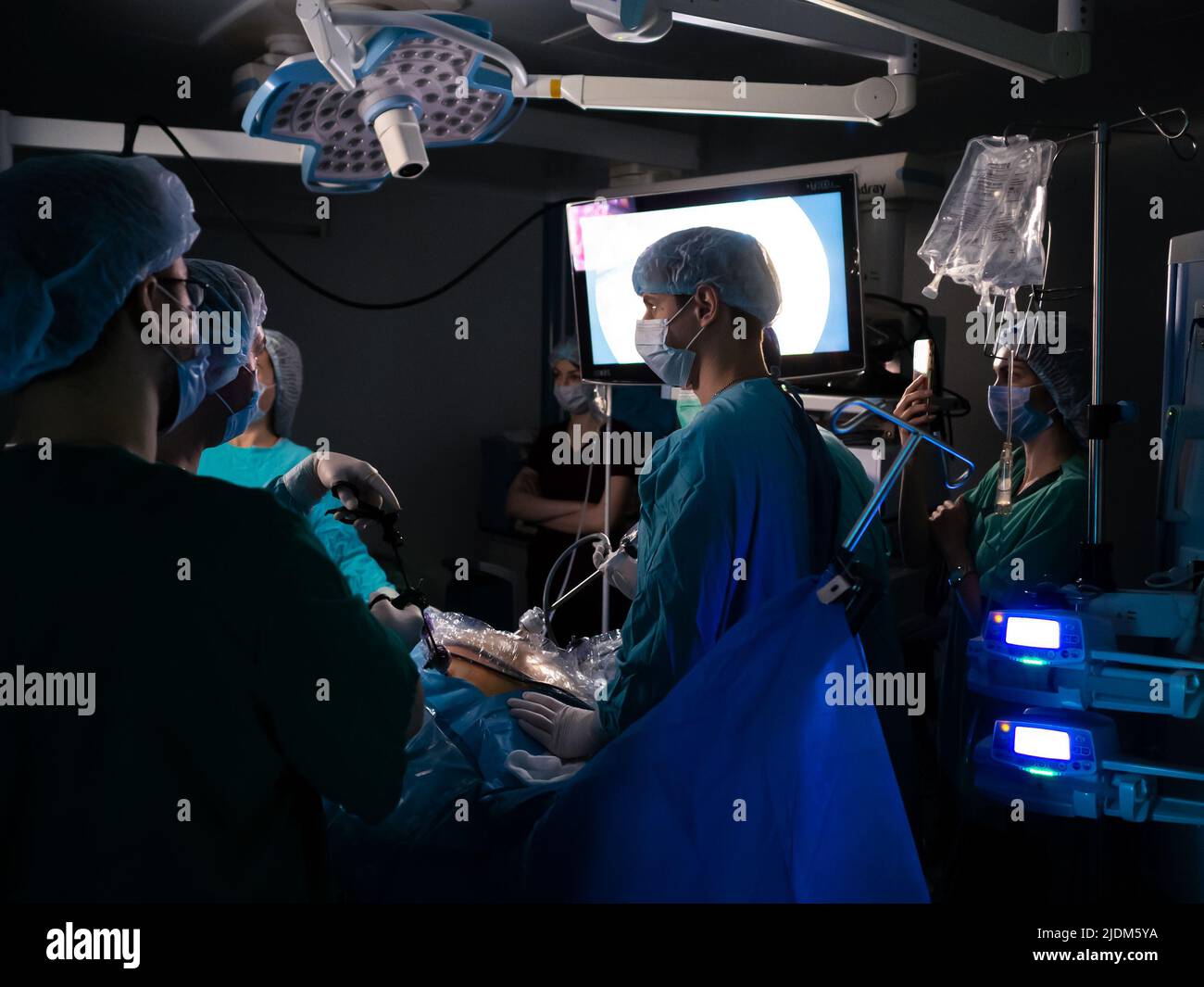 Moscow. Russia. October 18, 2021. Surgeons operate on a patient while ...