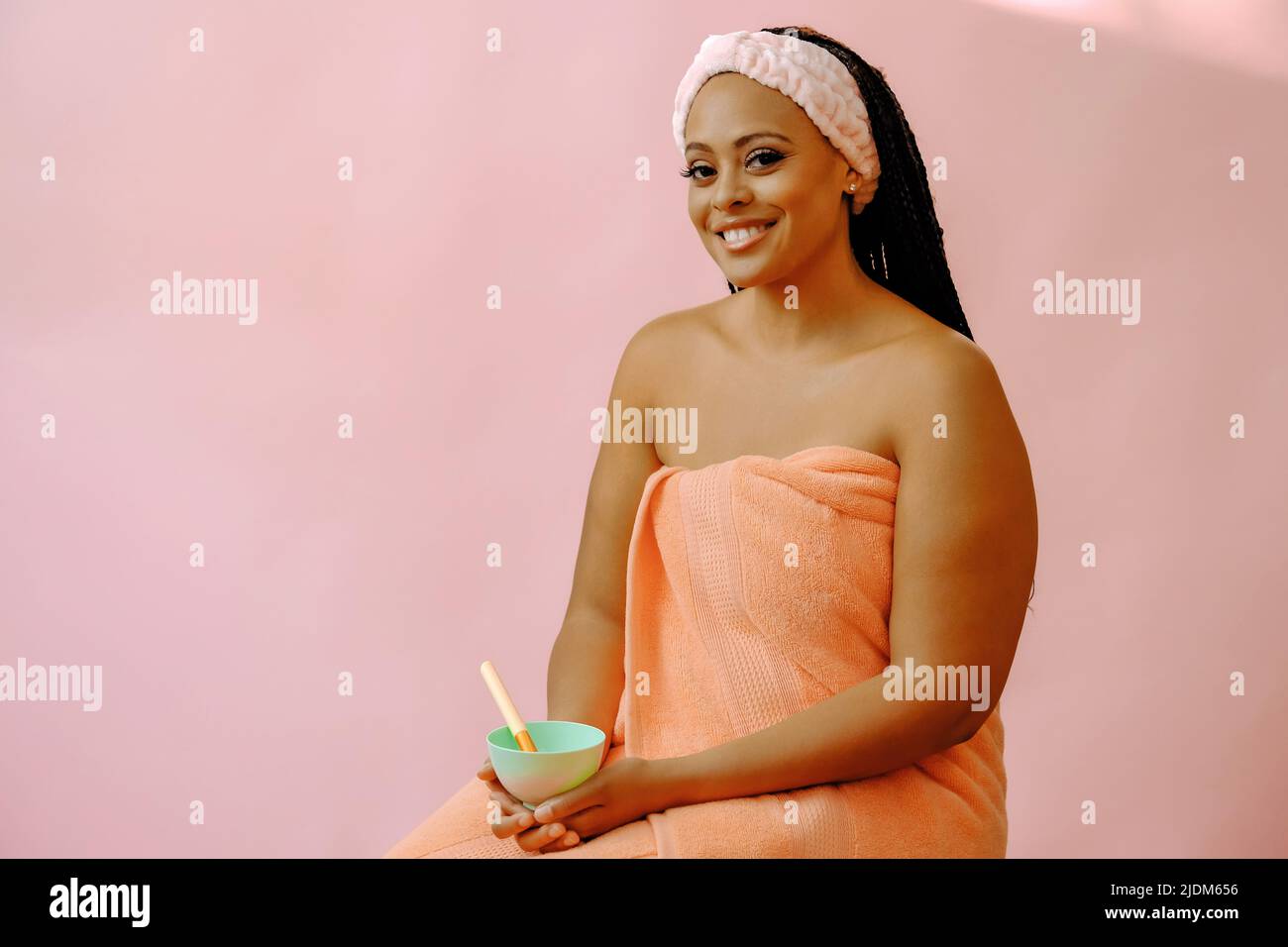 beauty black woman with perfect skin in towel clay body scrub ...