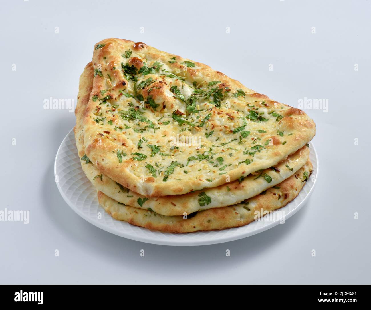 Garlic Naan Bread, traditional indian flatbread, baked in a clay oven ...