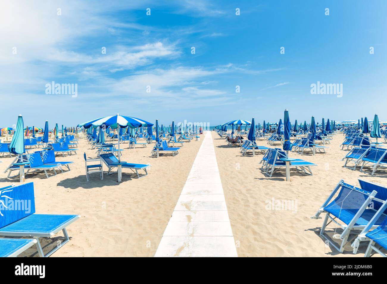 Beach on Italian riviera with walkway to seashore Stock Photo - Alamy