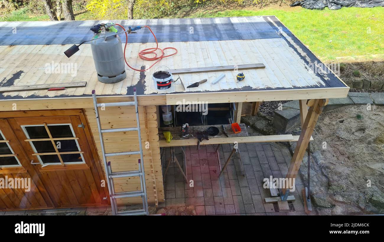 Roofing felt welding on bitumen roof roof repair with roofing felt and ...