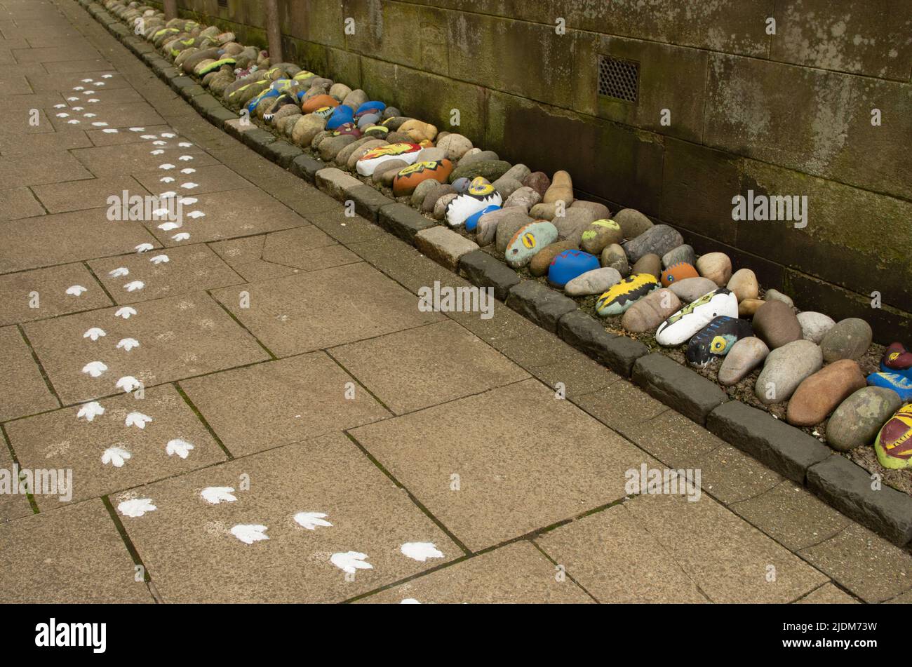Painted dinosaur stones as part of the 'Jurassic Lanark' family trail ...