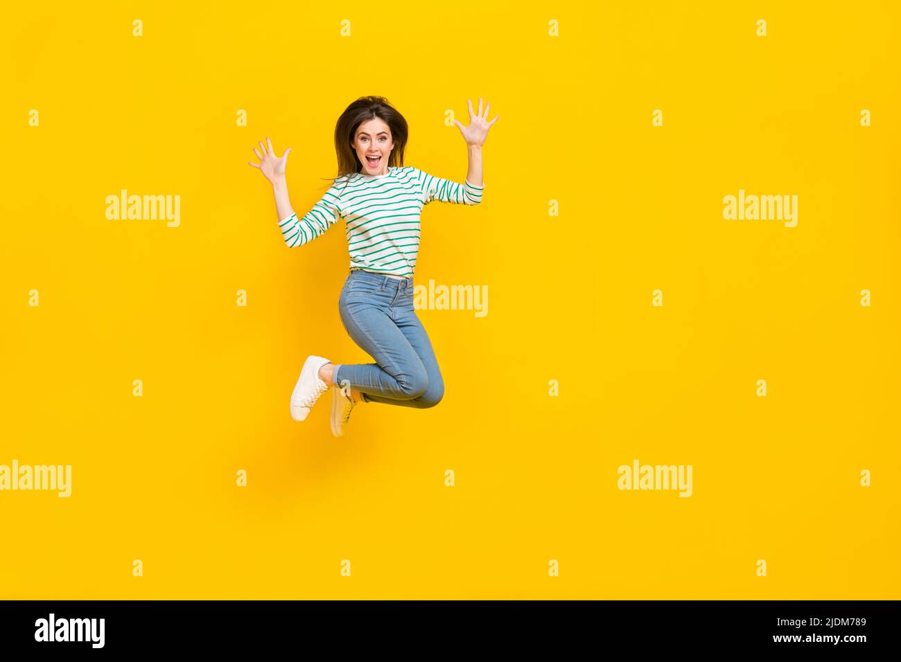 Full size photo of young charming ecstatic crazy girl jumping up enjoy ...