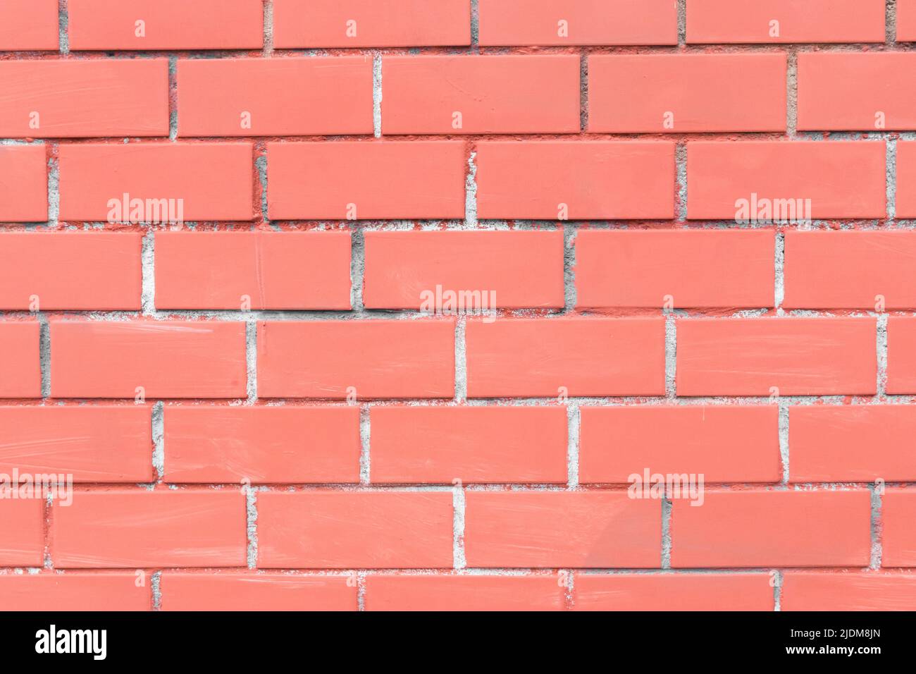 Old red paint brick wall texture stone color background Stock Photo - Alamy
