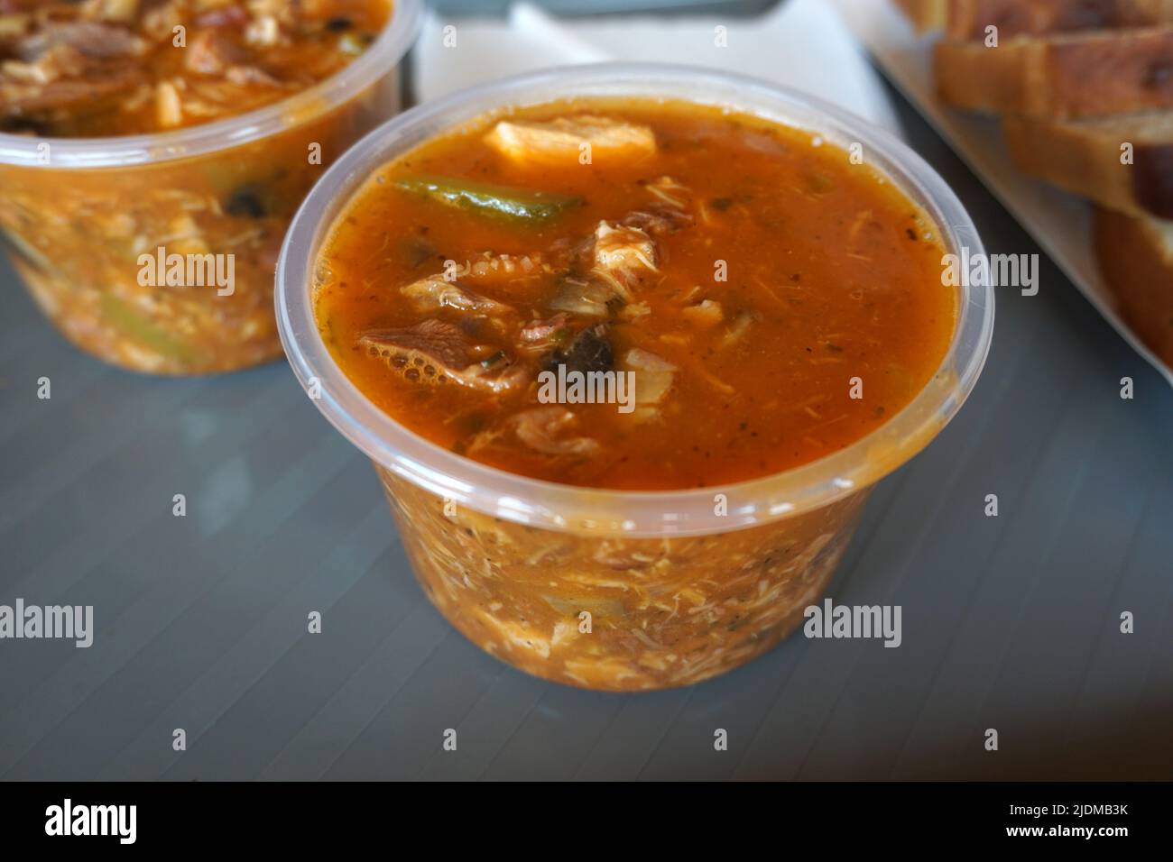 Meat soup in plastic containers Stock Photo - Alamy