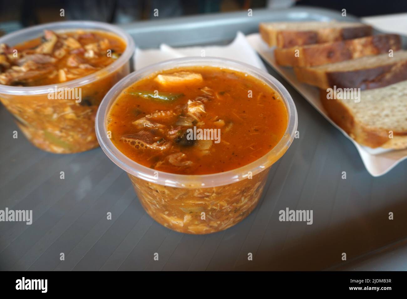 Meat soup in plastic containers Stock Photo - Alamy
