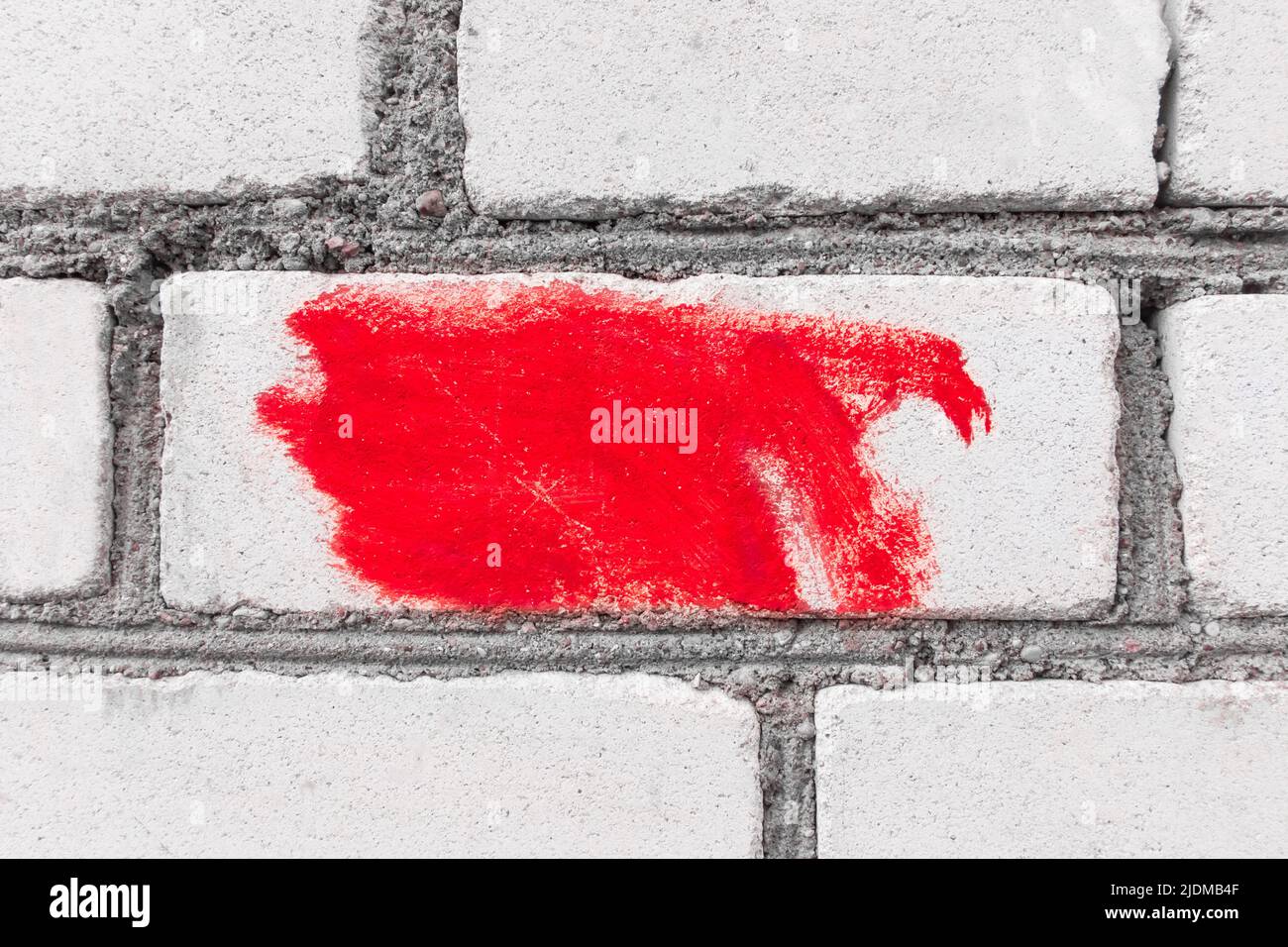 Red paint spot brush stain abstract pattern art urban wall background ...