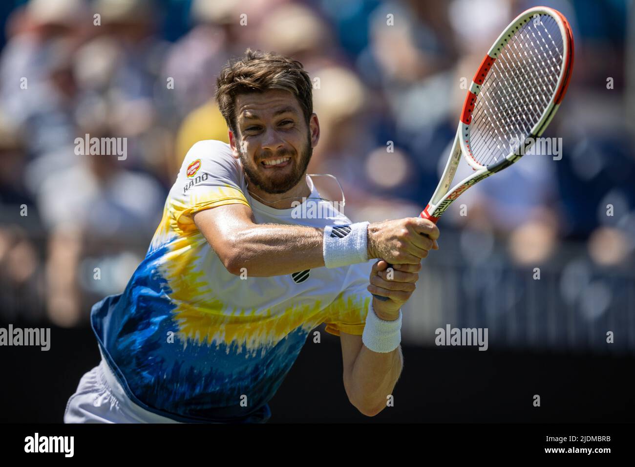 Eastbourne, England, 22 June, 2022. Cameron Norrie playing a two handed ...